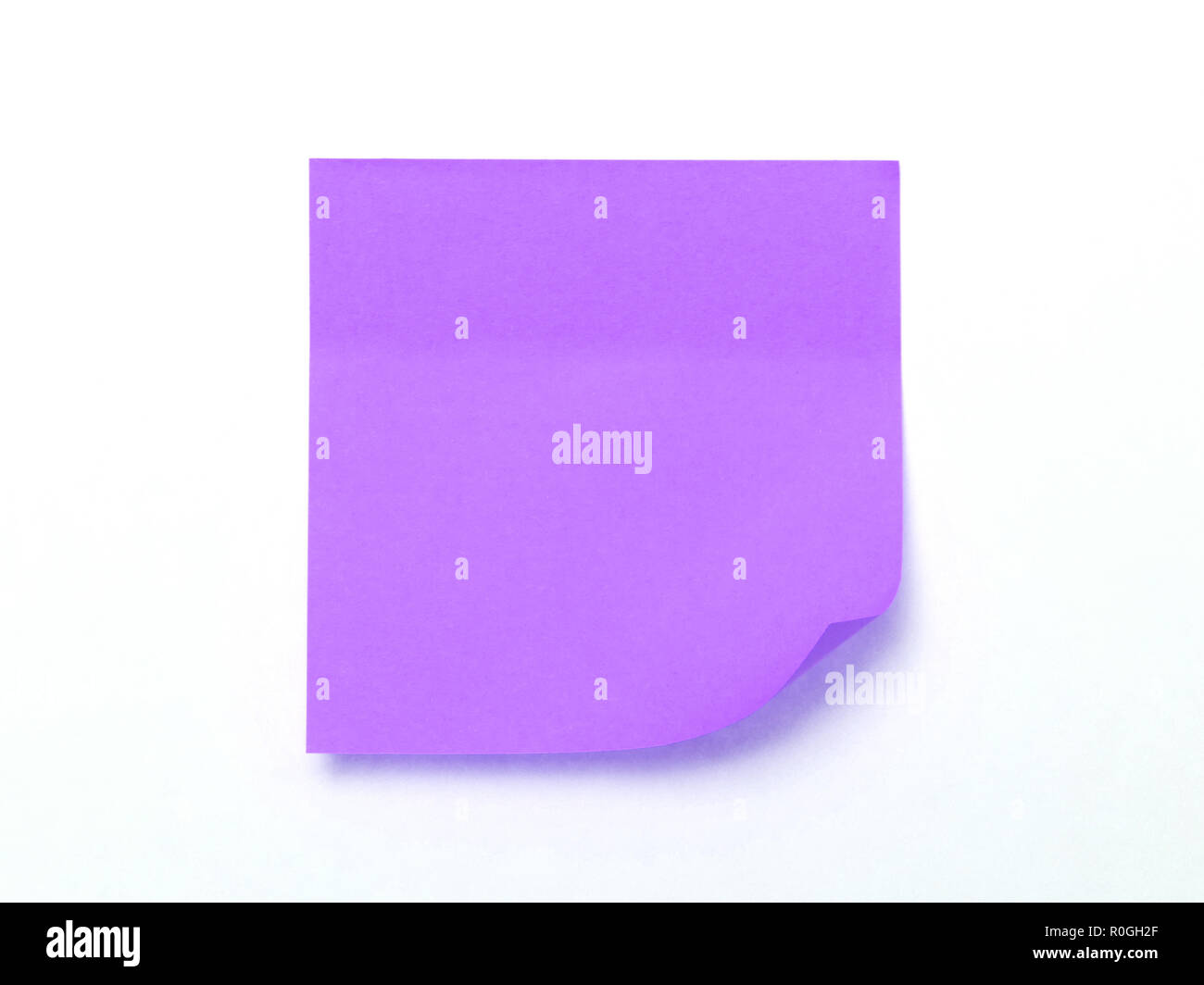 Purple sticky note isolated on a white background Stock Photo - Alamy