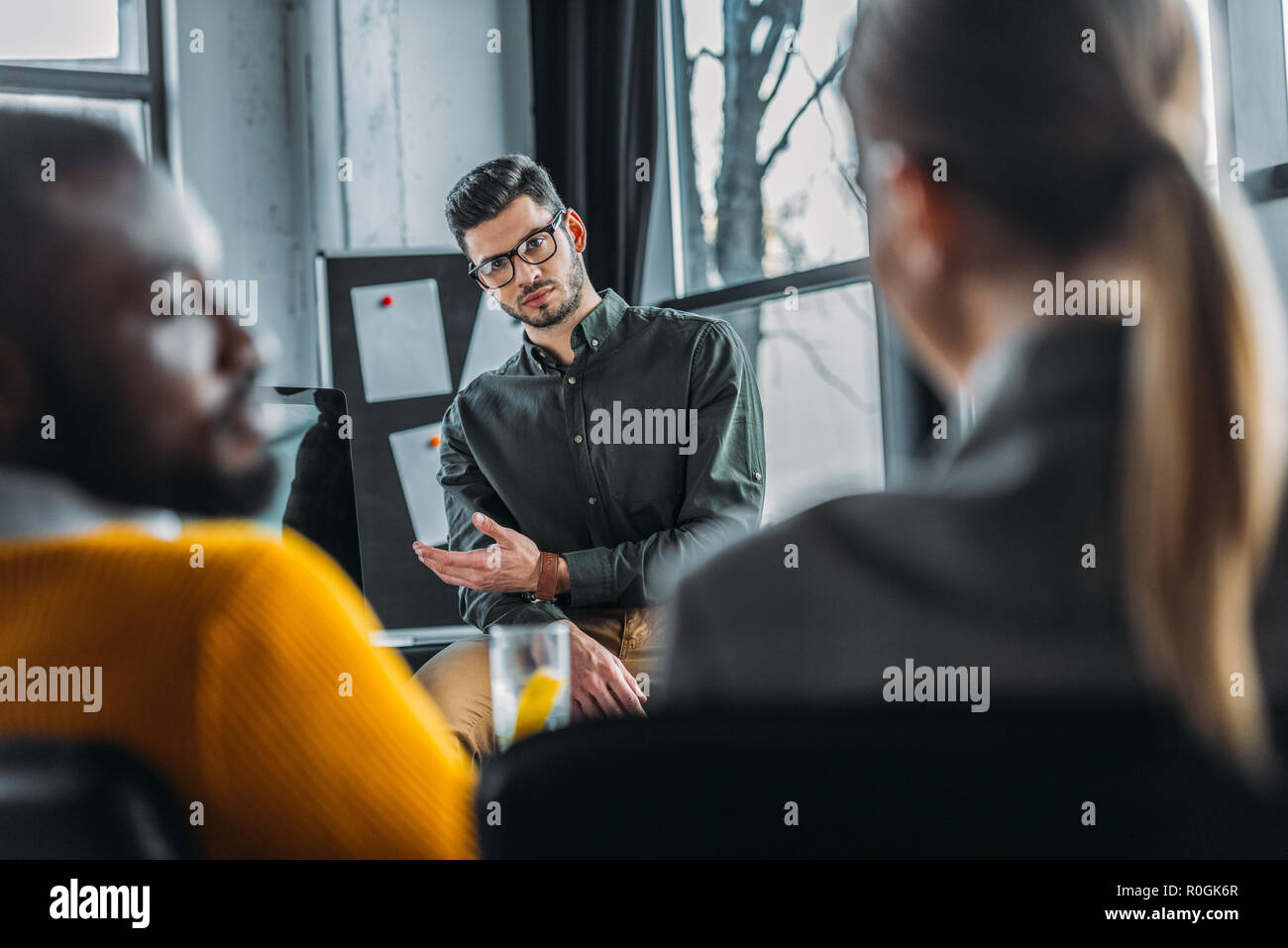 multicultural managers during meeting in office Stock Photo - Alamy