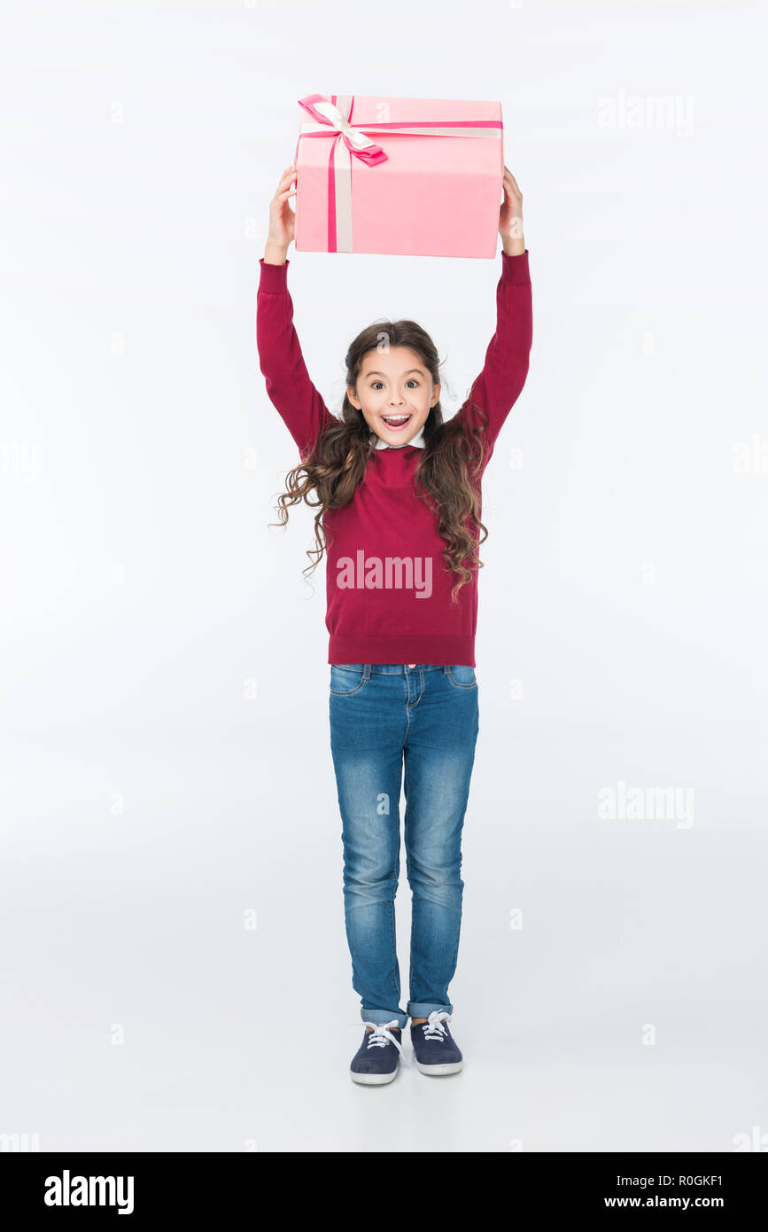 happy kid with present looking at camera isolated on white Stock Photo ...