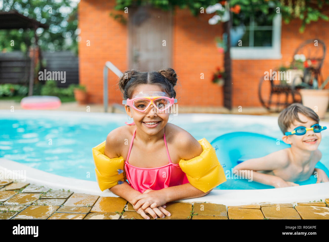 Kids Swimming In Pool High Resolution Stock Photography and Images - Alamy