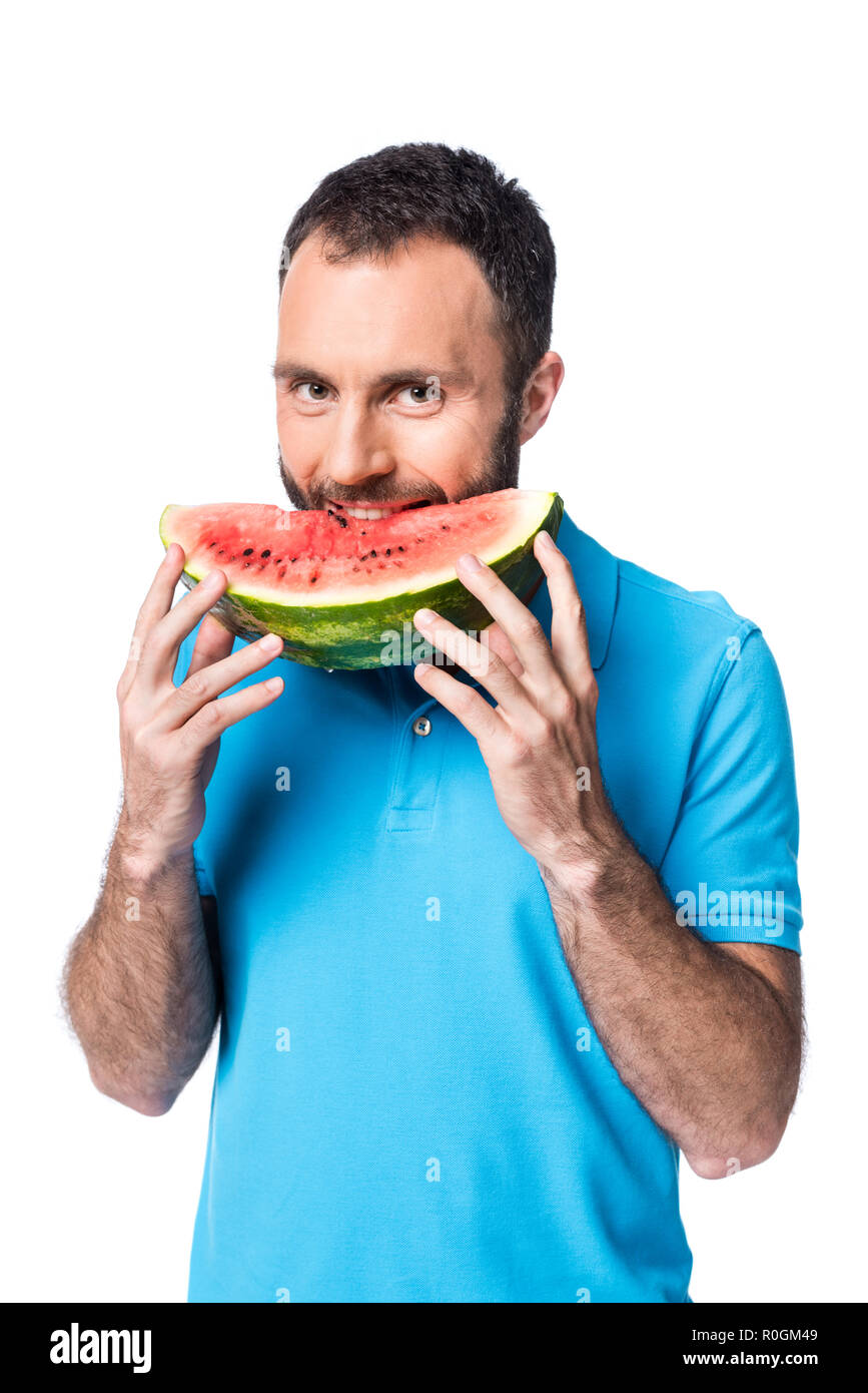 man in blue polo eating watermelon isolated on white Stock Photo - Alamy
