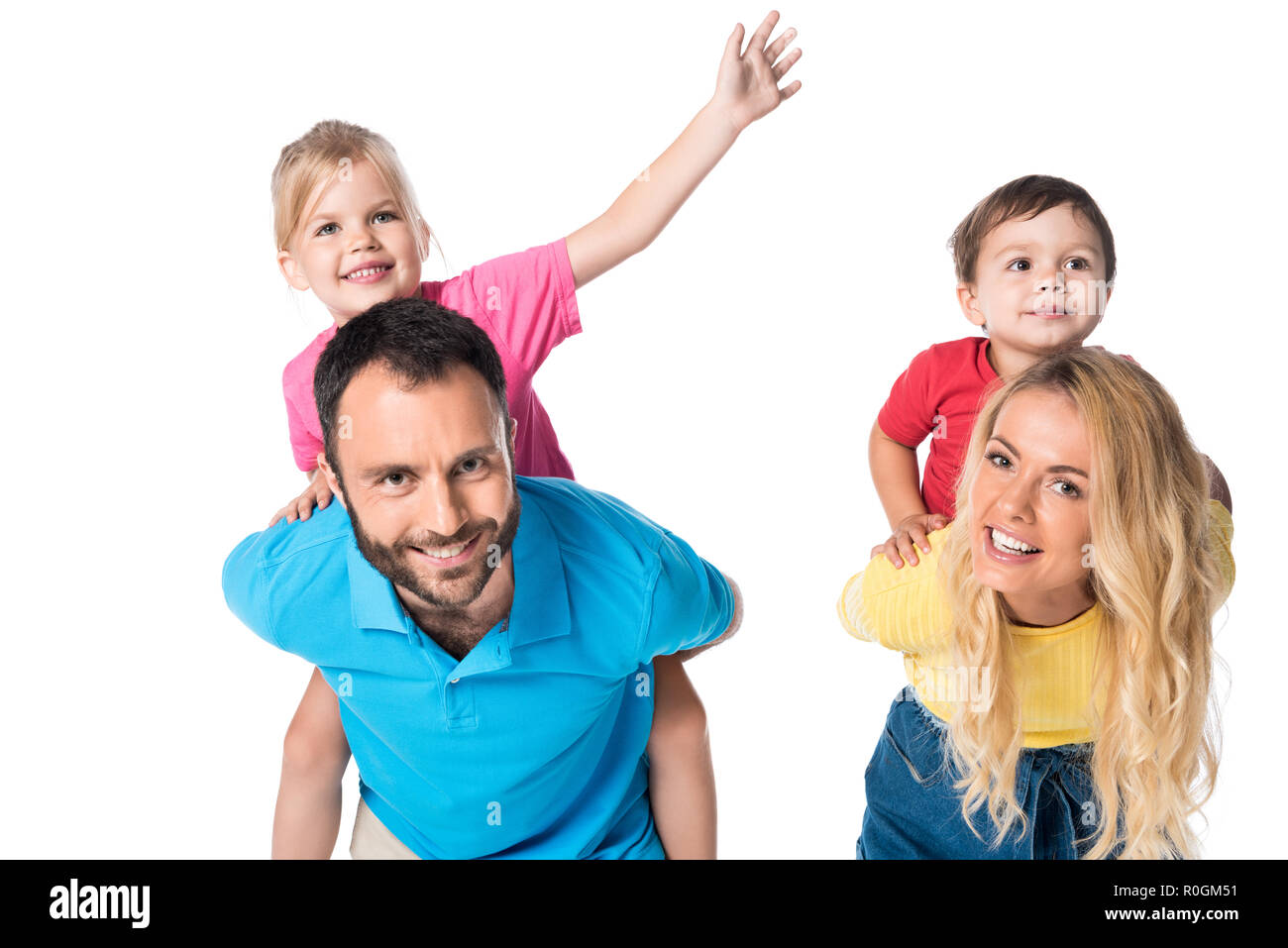 Happy parents piggybacking kids hi-res stock photography and images - Alamy