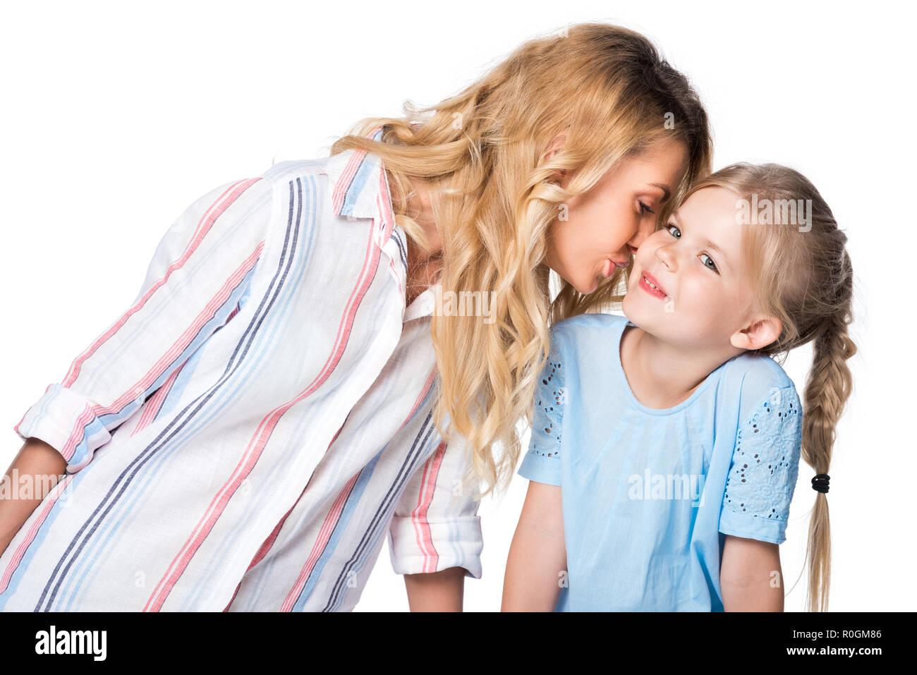 Mother kissing daughter isolated on hi-res stock photography and images ...