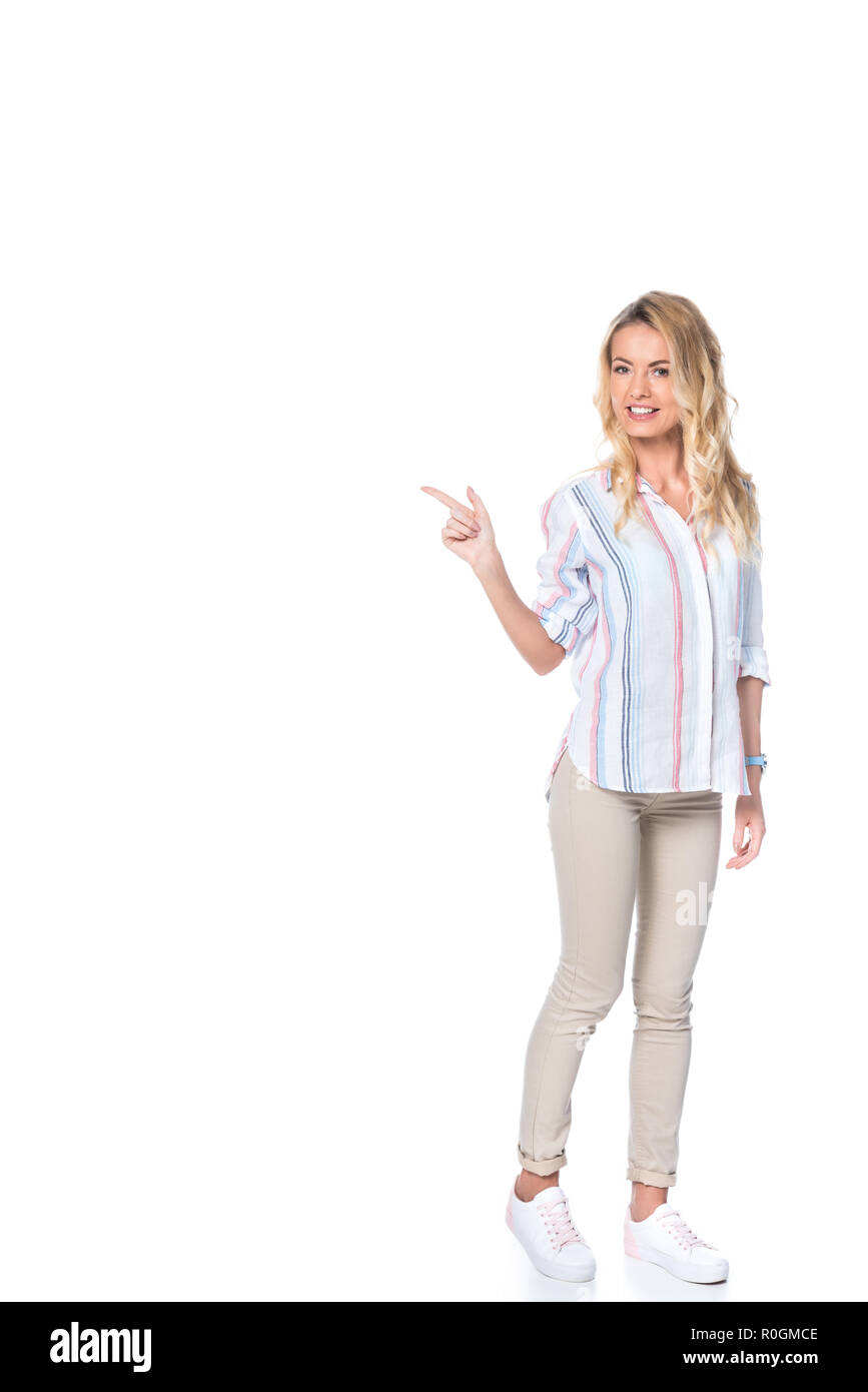 happy woman pointing at something isolated on white Stock Photo - Alamy