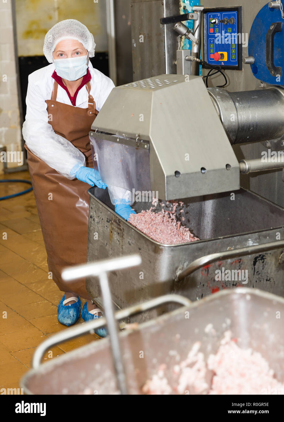 Meat Grinder People Stock Photos & Meat Grinder People Stock Images - Alamy