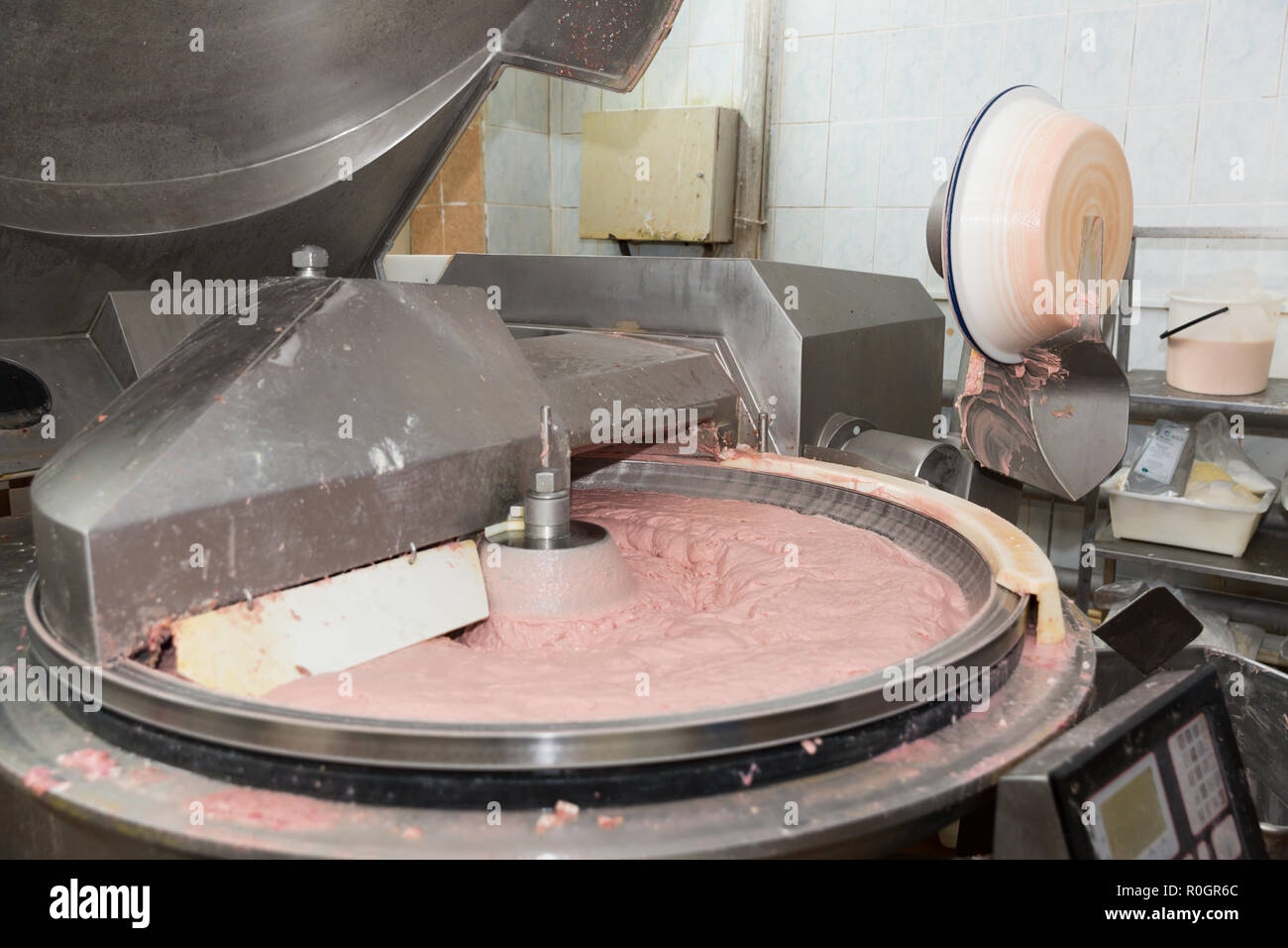Process of making finely ground meat batter in bowl chopper for cooked ...