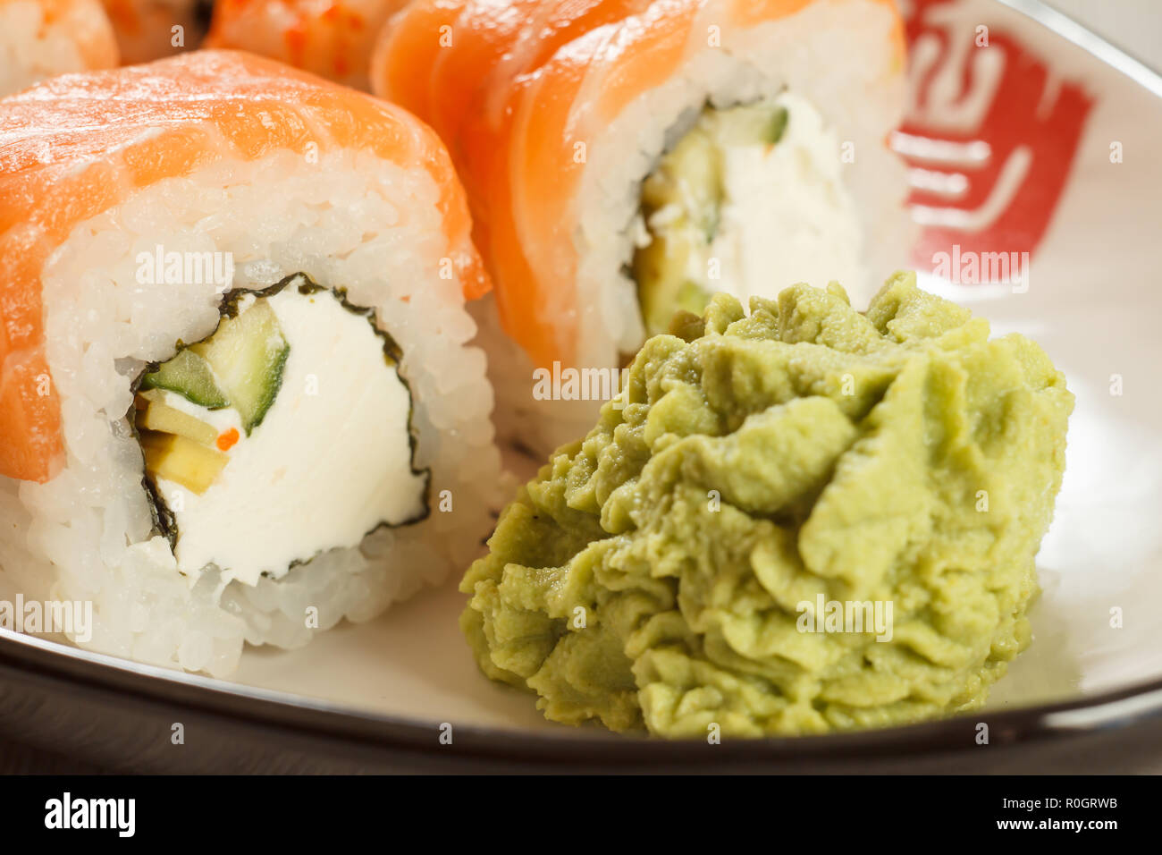 Close up Uramaki Philadelphia. Sushi rolls with salmon, nori, rice ...