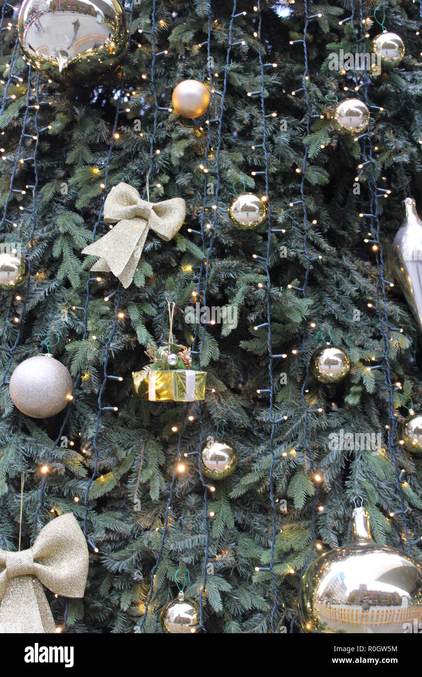 Christmas tree with golden decorations outdoors in Manchester ...