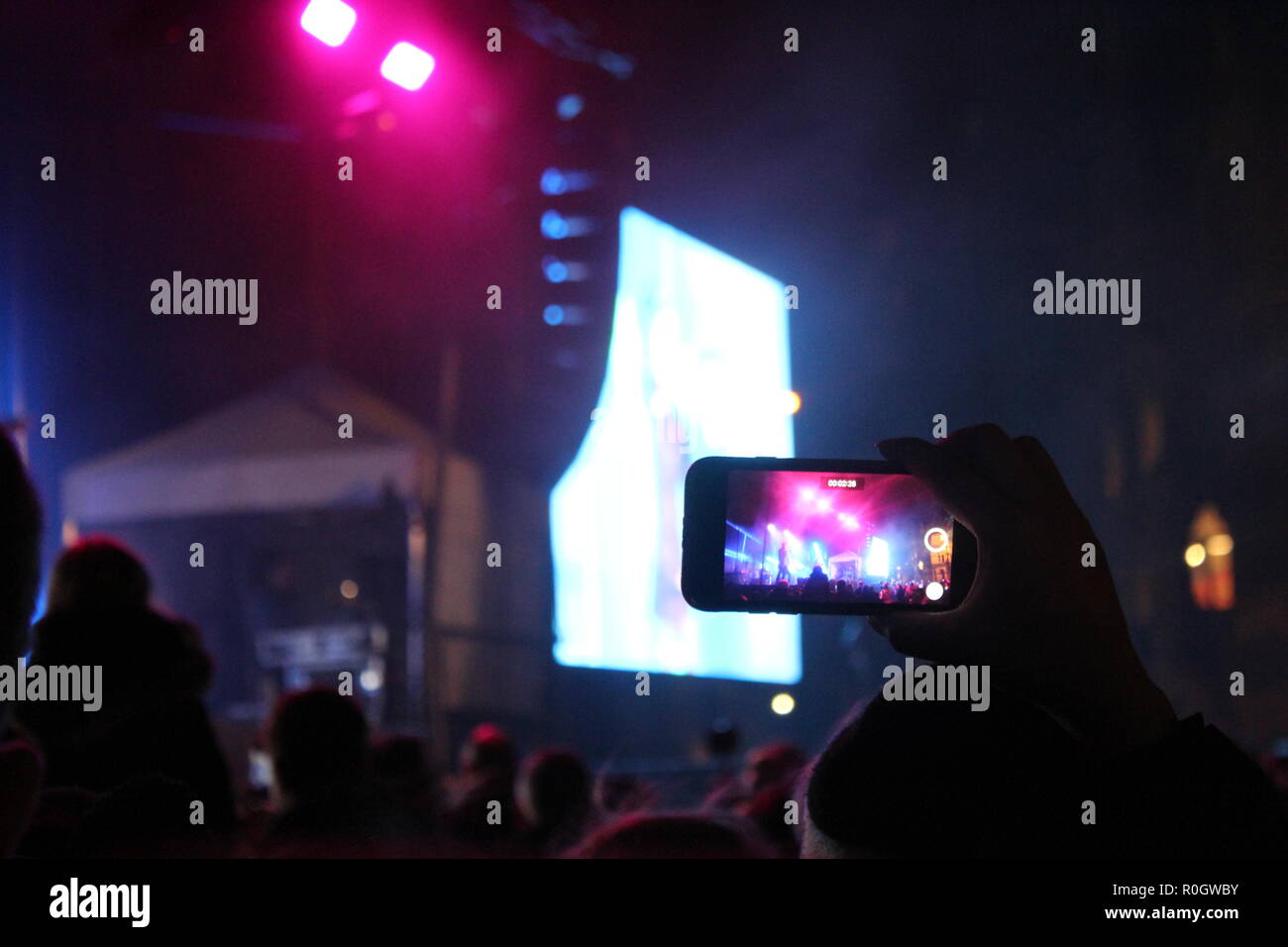 Smart phone at a music concert - Watching a performance through a cell ...