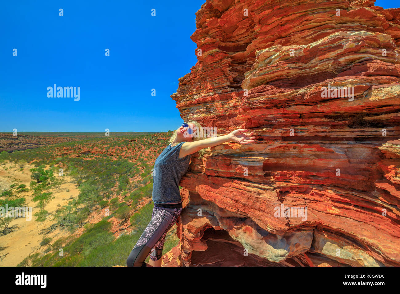 Woman climbing window hi-res stock photography and images - Alamy