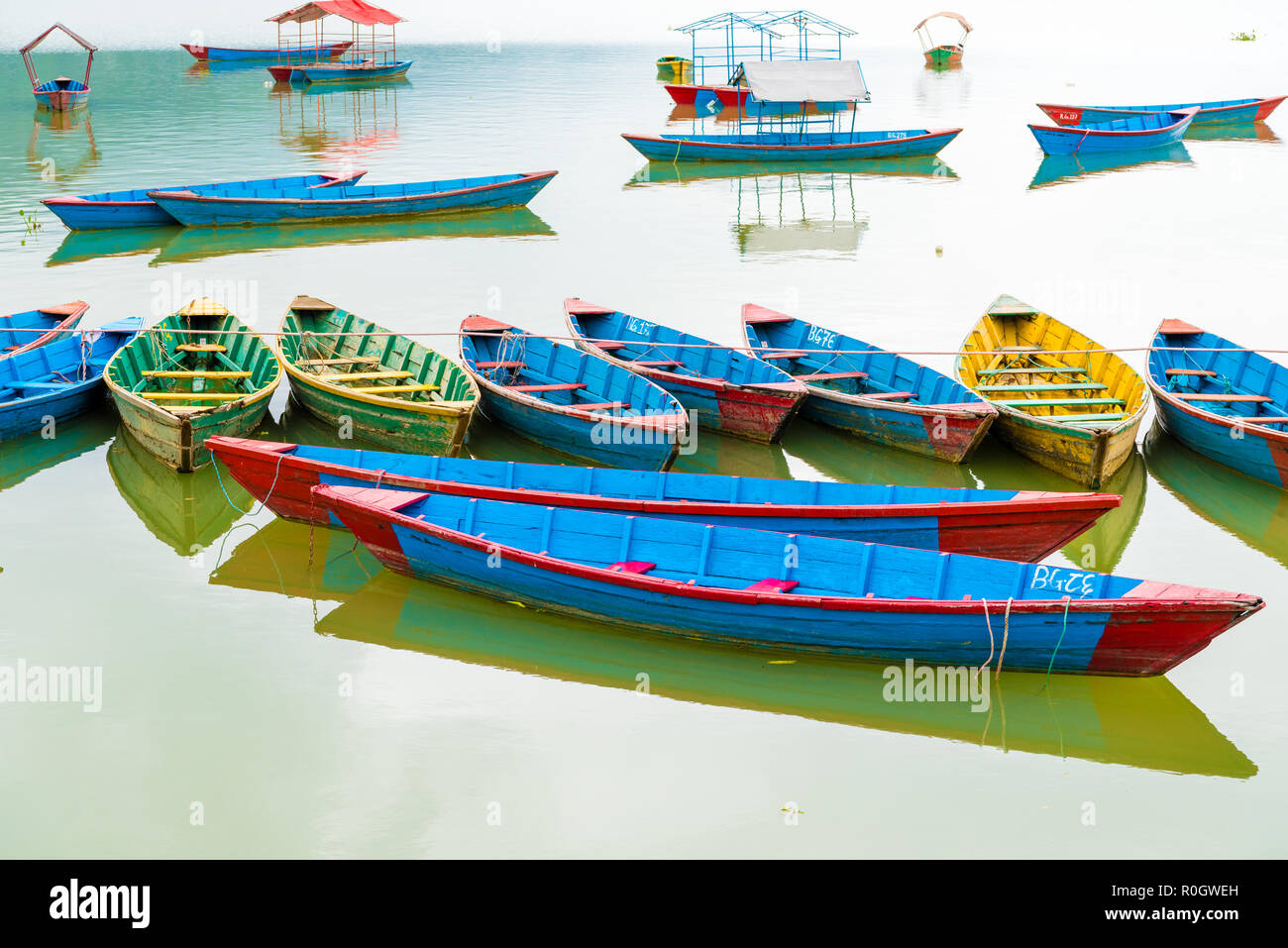 Pokhara, Nepal - July 31, 2018 : Colourful boats on Phewa lake in ...