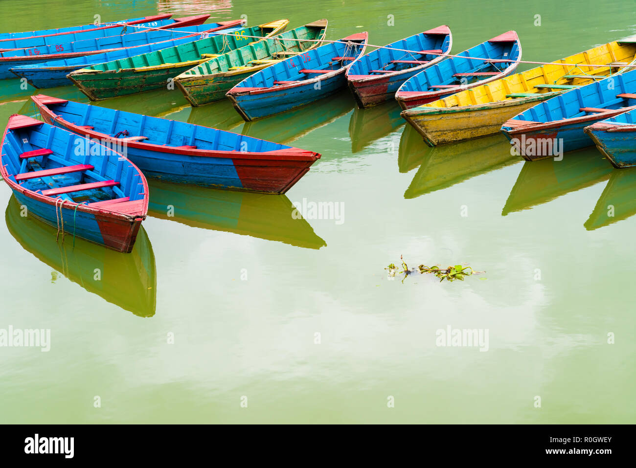 Pokhara, Nepal - July 31, 2018 : Colourful boats on Phewa lake in ...