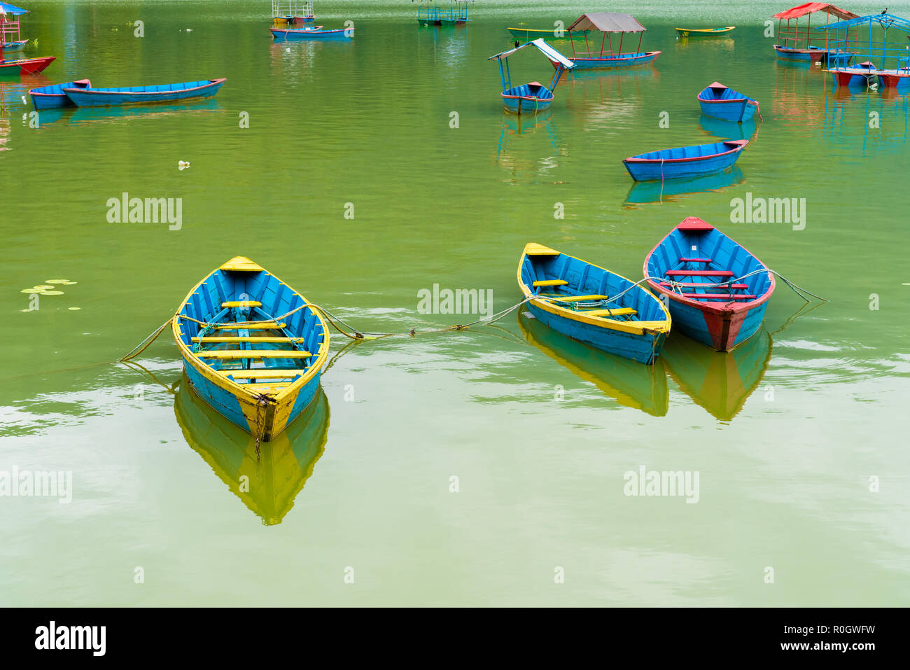 Pokhara, Nepal - July 31, 2018 : Colourful boats on Phewa lake in ...