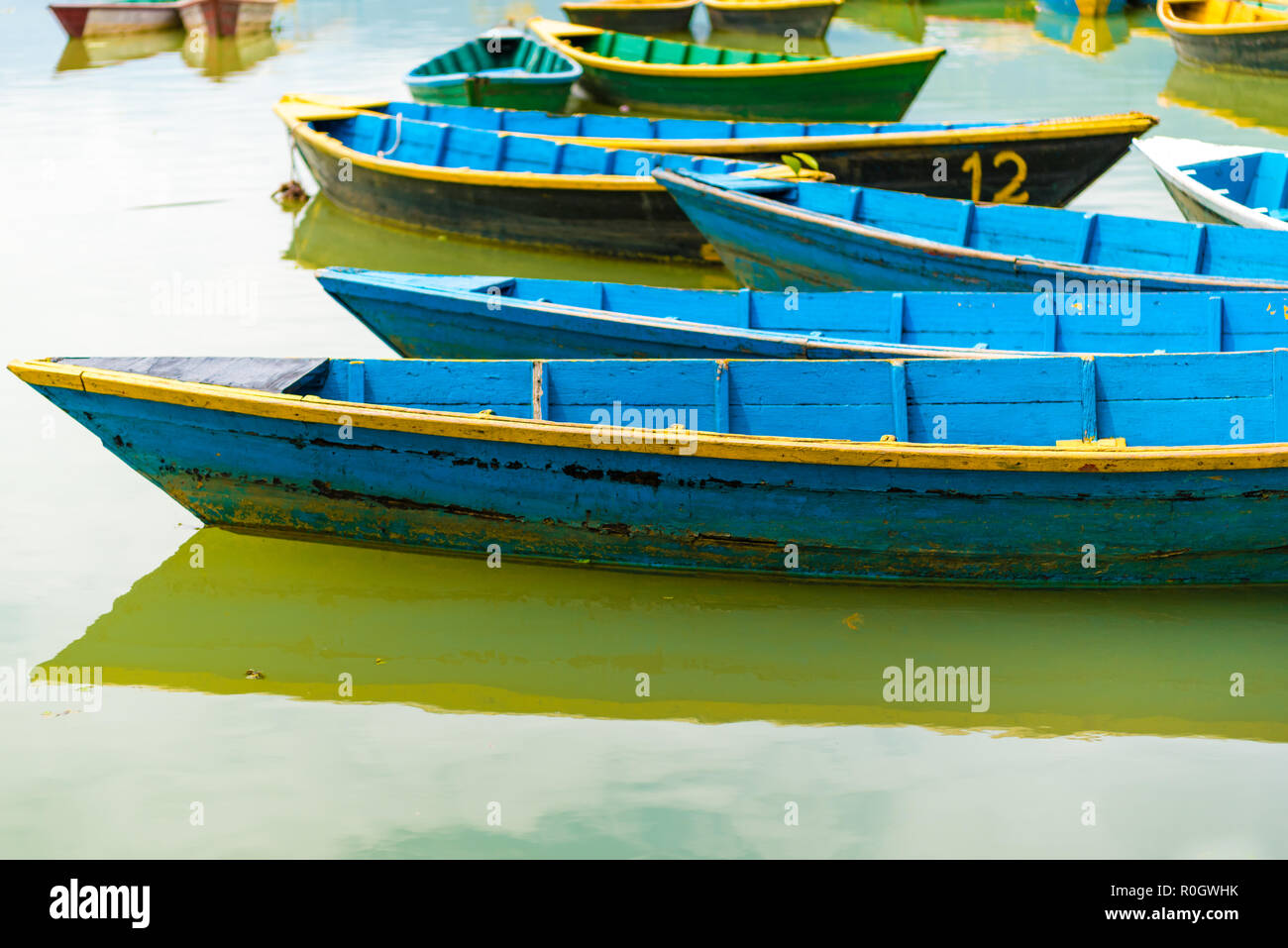 Pokhara, Nepal - July 31, 2018 : Colourful boats on Phewa lake in ...