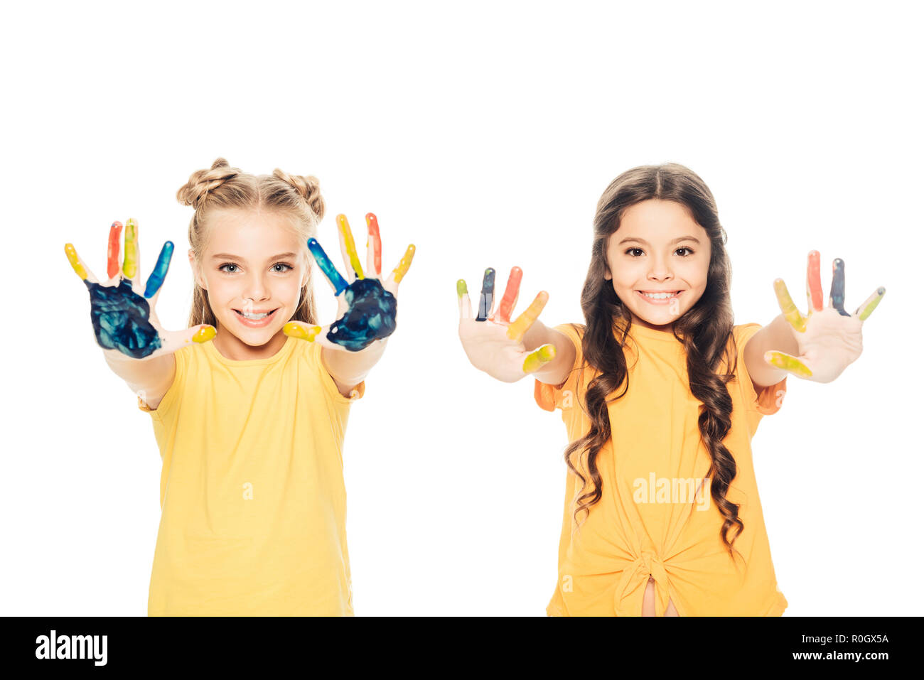 beautiful happy children showing colorful painted hands and smiling at ...