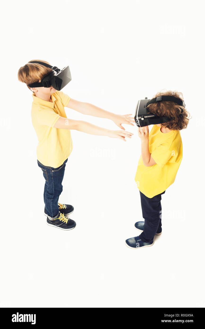high angle view of kids using virtual reality headsets isolated on ...