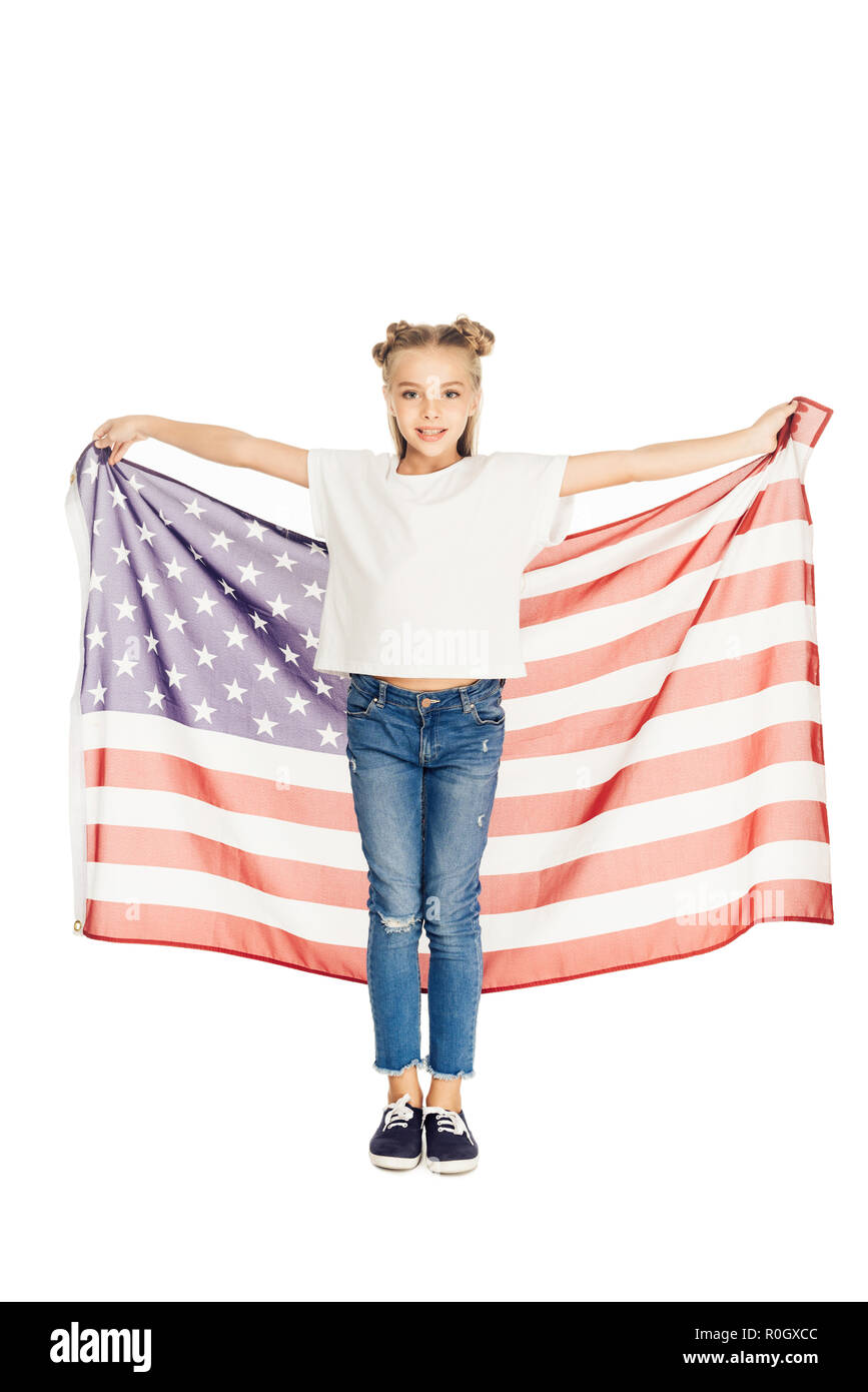 smiling adorable kid holding american flag and looking at camera ...