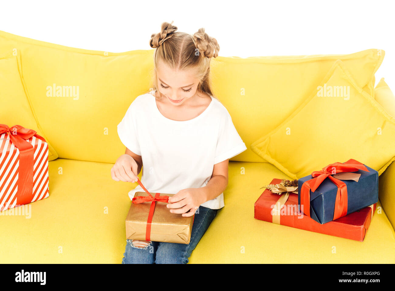 Child opening present hi-res stock photography and images - Alamy