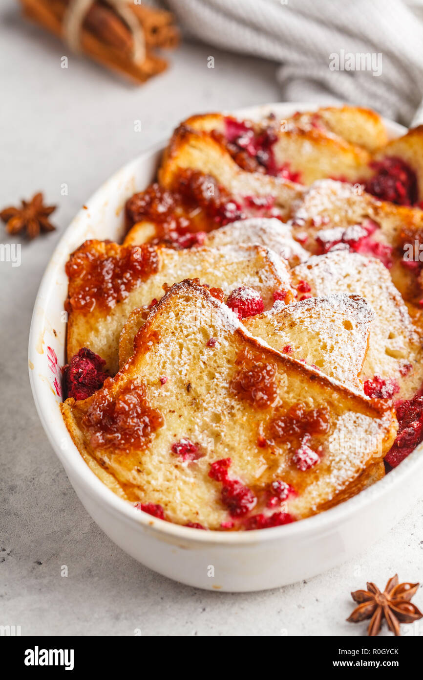 French toast casserole with raspberries, powdered sugar and cinnamon ...