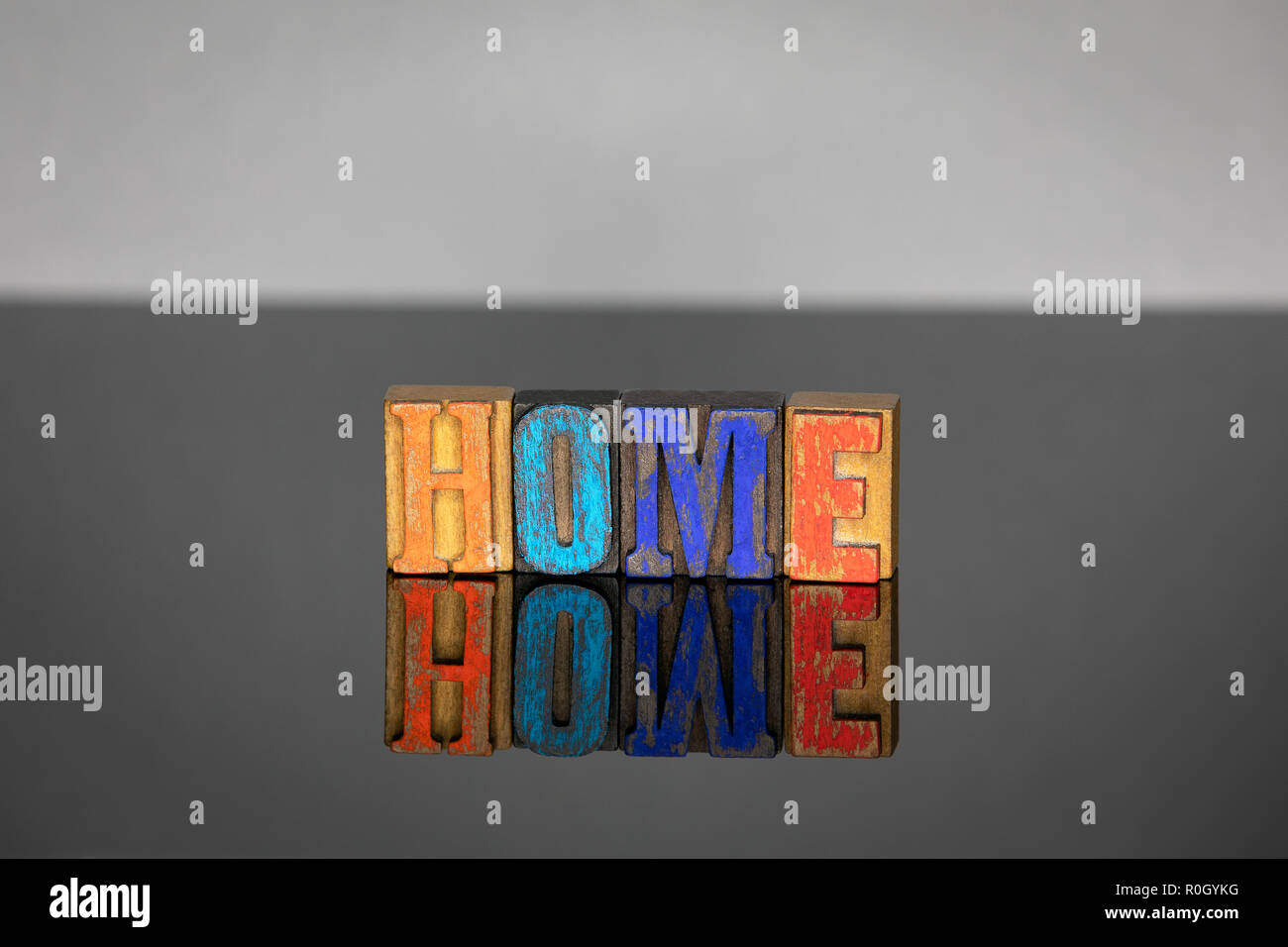 Home word from colored wooden letters Stock Photo - Alamy