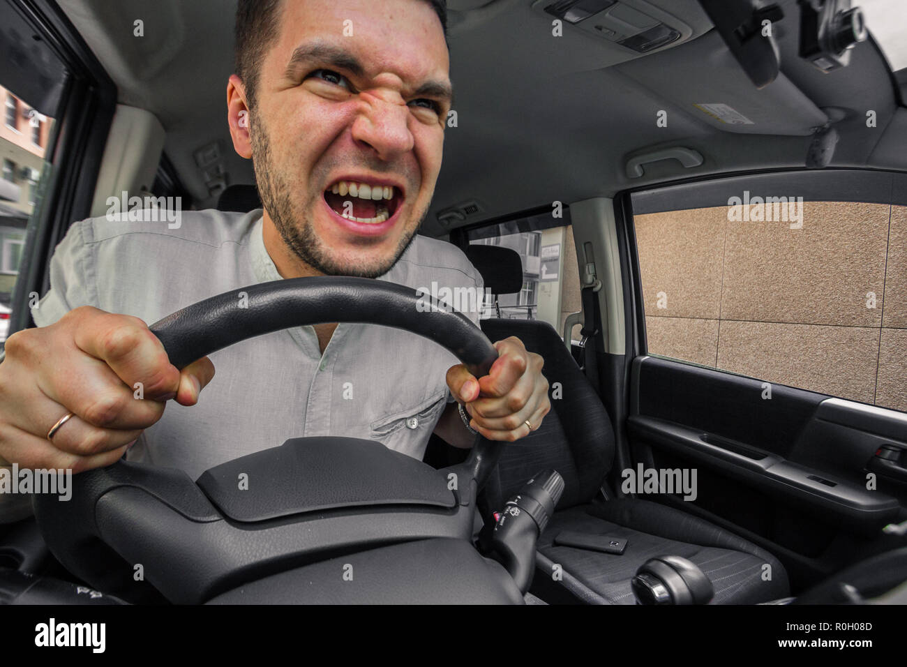 Stressed driver behind wheel hi-res stock photography and images - Alamy