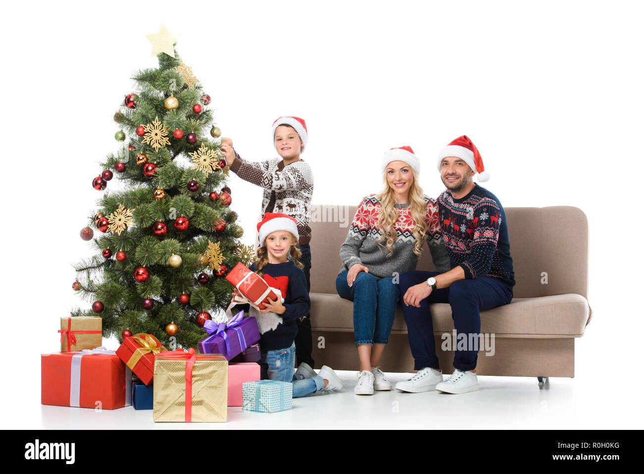 happy family with children near christmas tree with presents, isolated ...