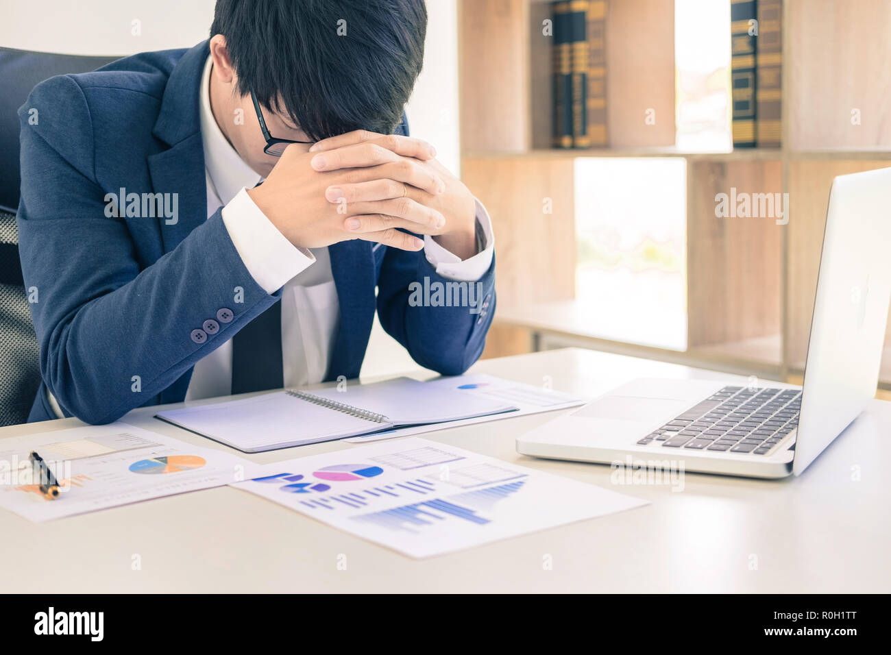 Depressed failure and tired businessman late sad and solving problem in ...