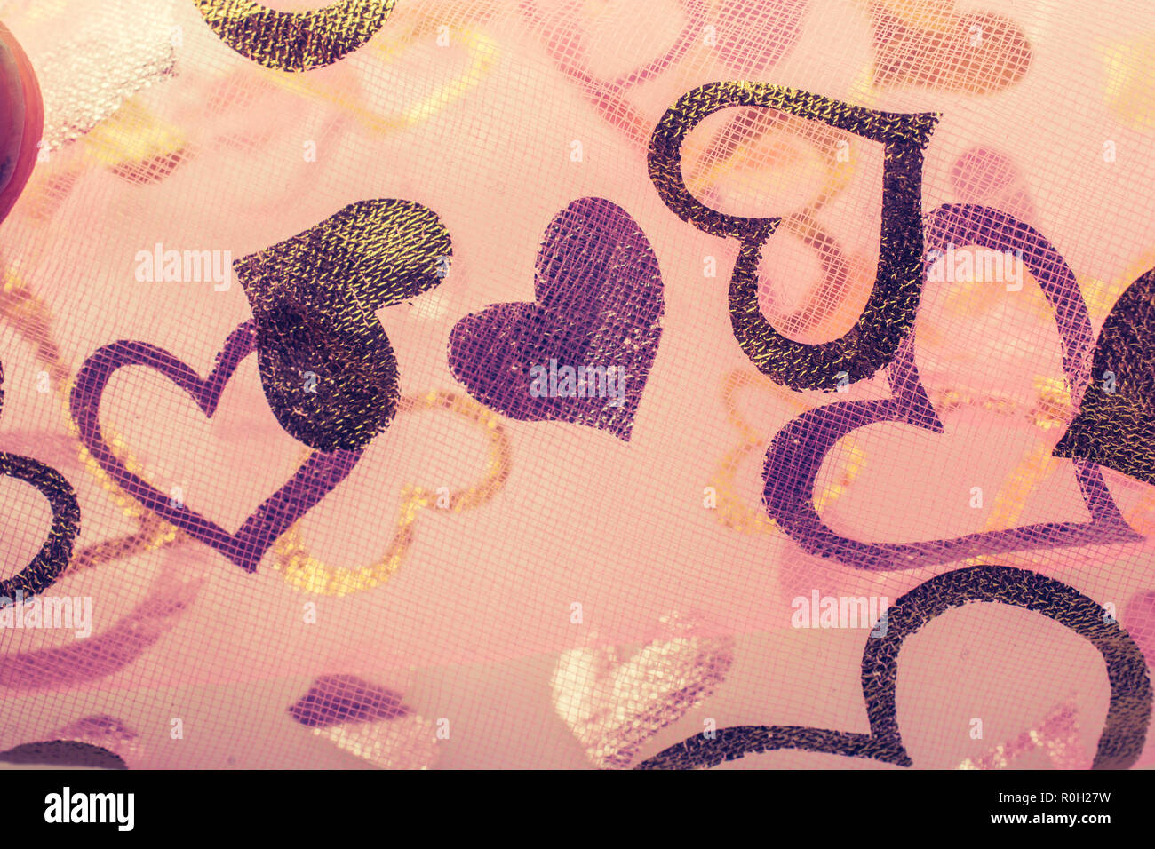 Colorful fabric with heart shapes patterns on it Stock Photo - Alamy
