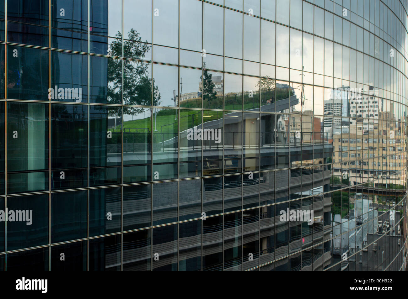 A city reflection in the glass on a skyscraper Stock Photo - Alamy