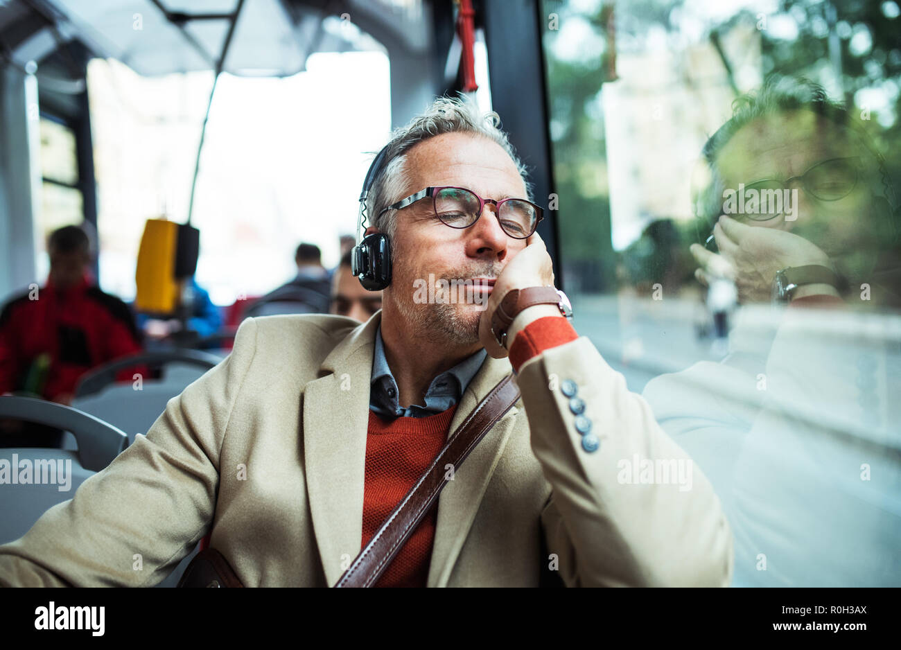 Person sleeping bus hi-res stock photography and images - Alamy