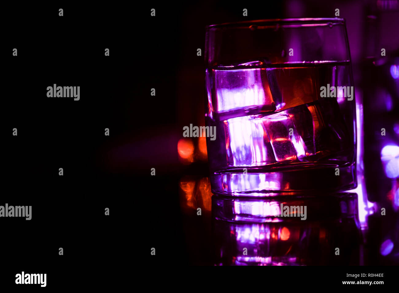 colored lighting of glasses in the night club bar Stock Photo - Alamy