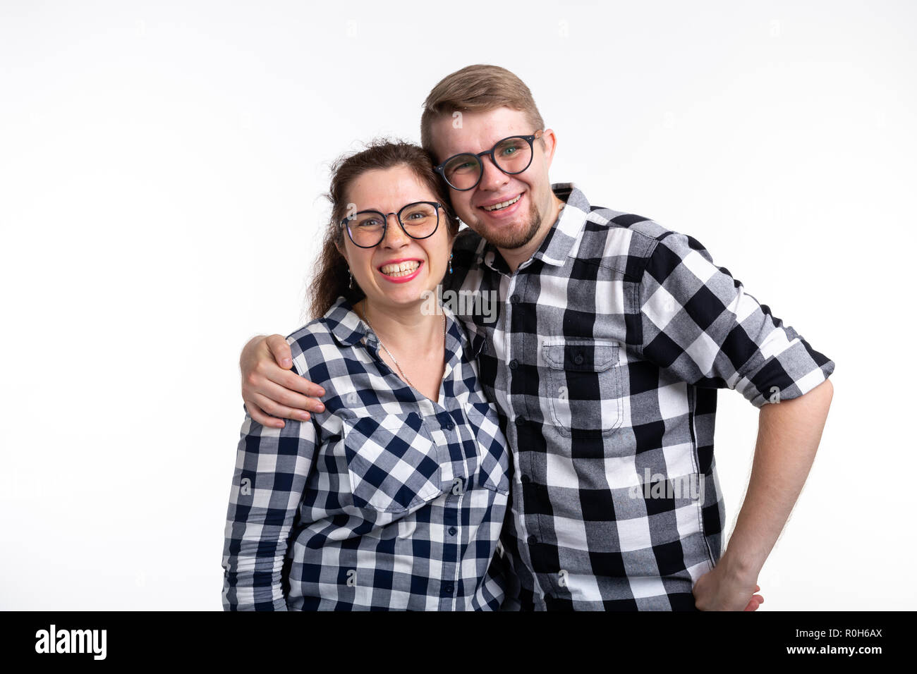 Nerds, geek, bespectacled and funny people concept - funny couple in ...