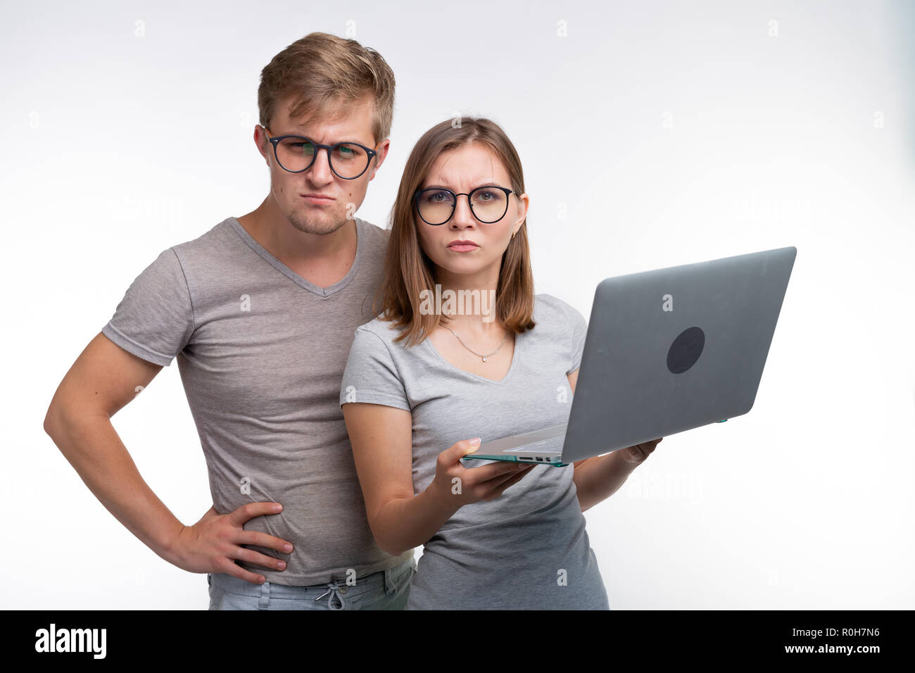 Nerds, study, people concept - a couple of student people look with ...