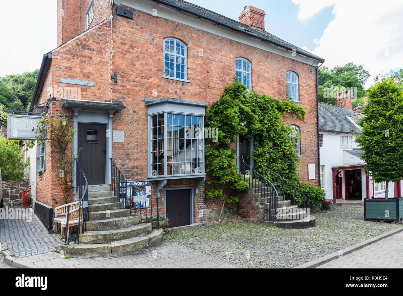 Shop and house with steps, Montgomery, Powys, Wales, UK Stock Photo - Alamy