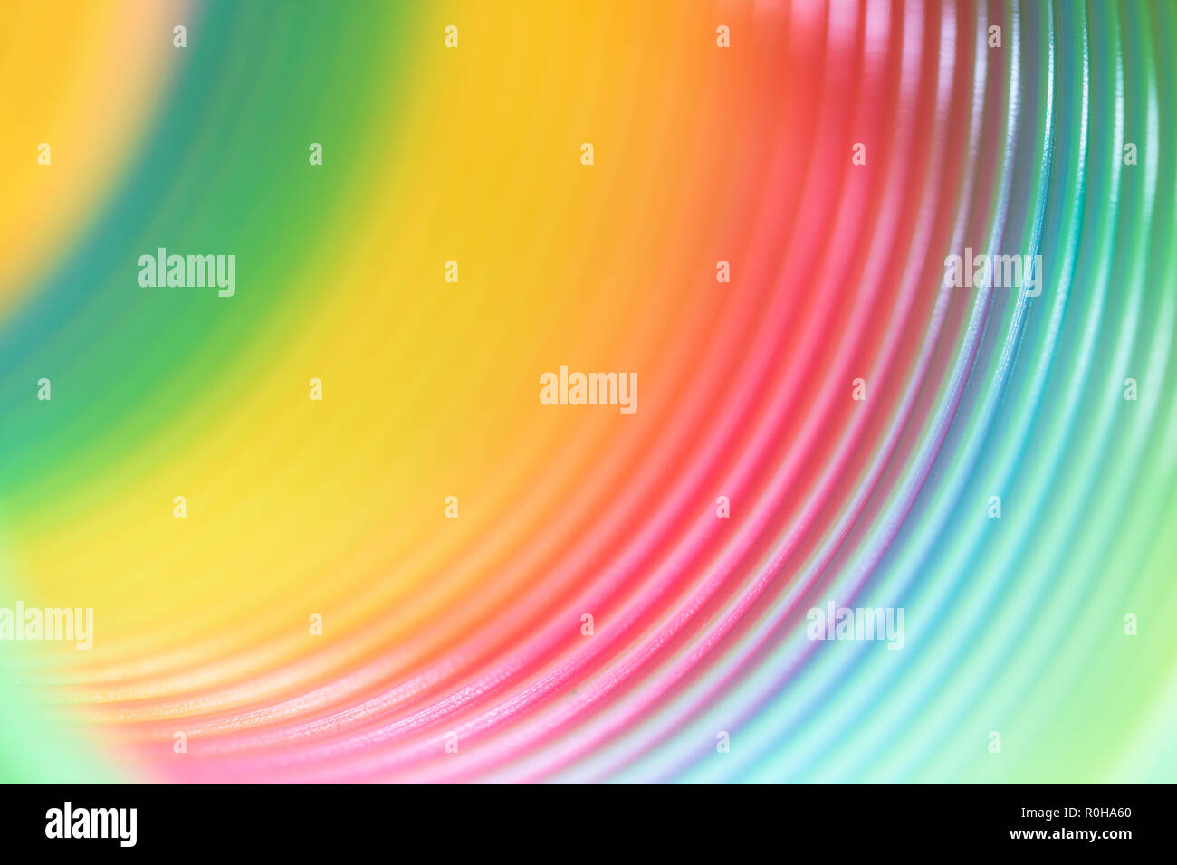 Swirls of blurred colors form abstract pattern from a plastic toy ...