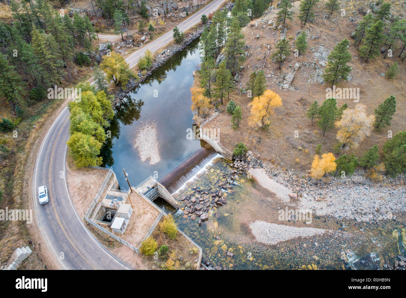 a diversion dam on the Cache la Poudre River at a canyon above Fort ...