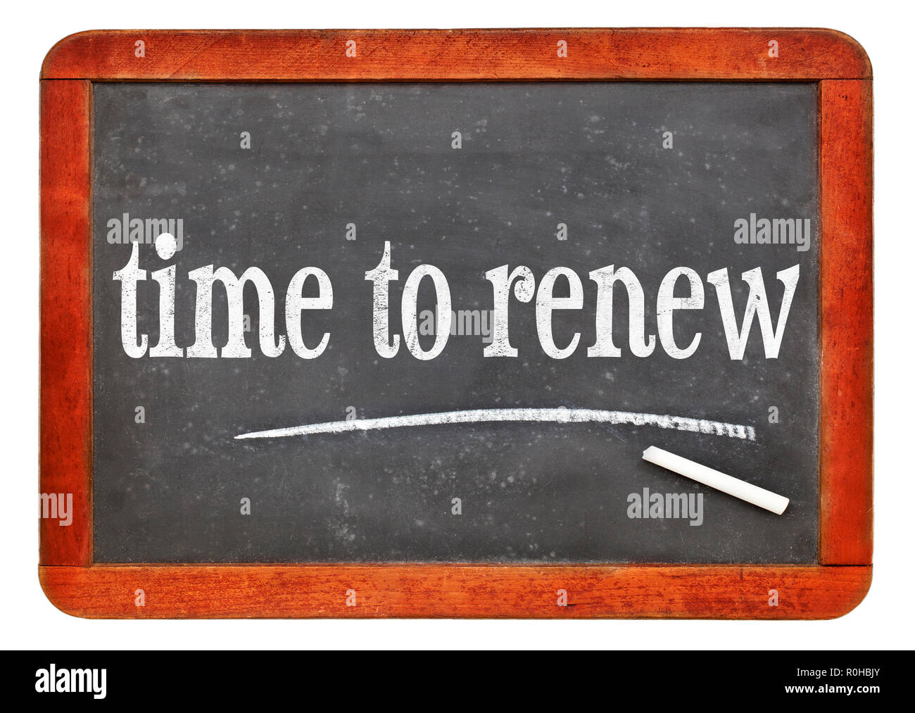time to renew sign - white chalk text on a vintage slate blackboard ...