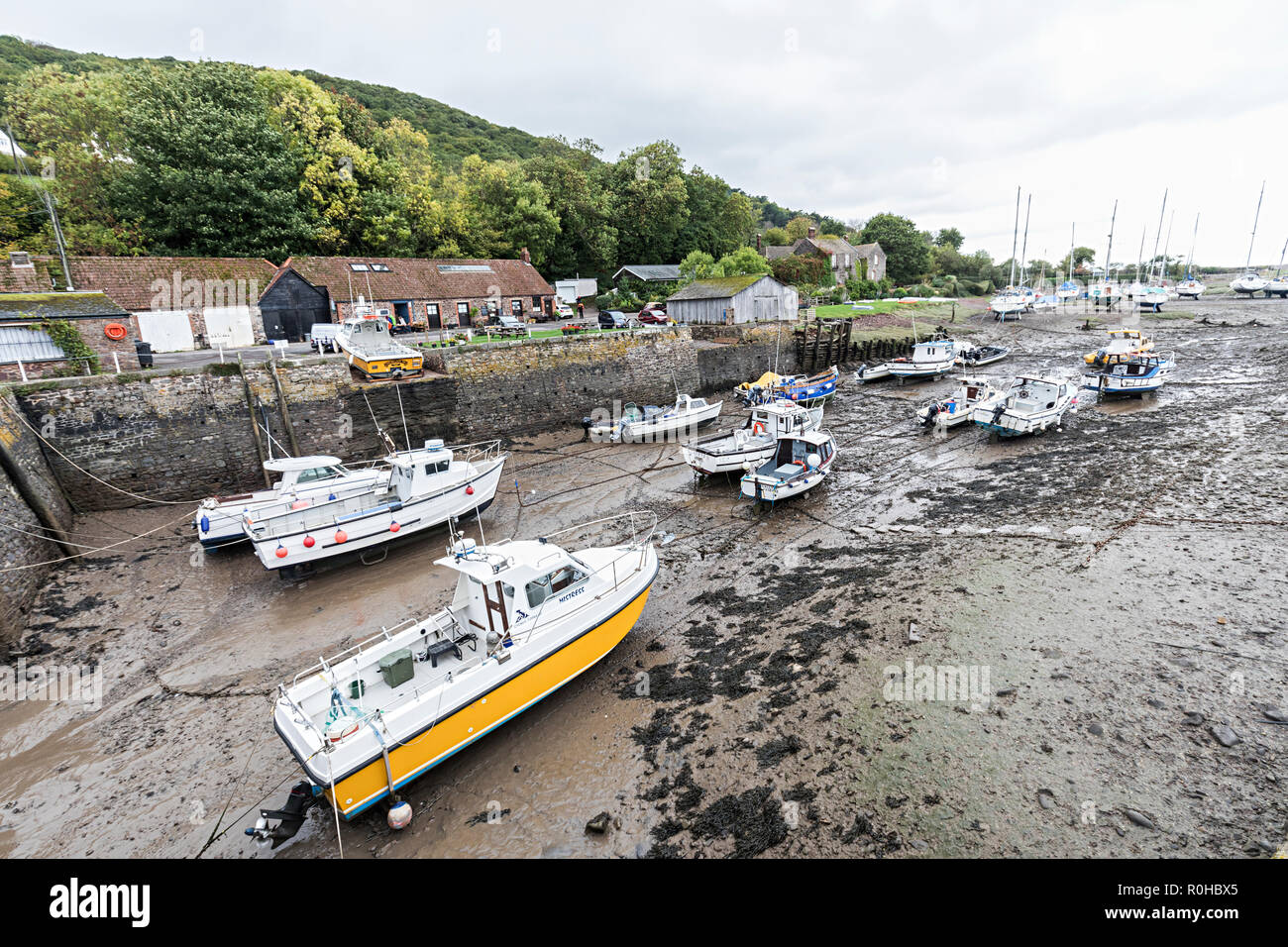 Boats in harbour, low tide, Porlock Weir, Devon, UK Stock Photo - Alamy