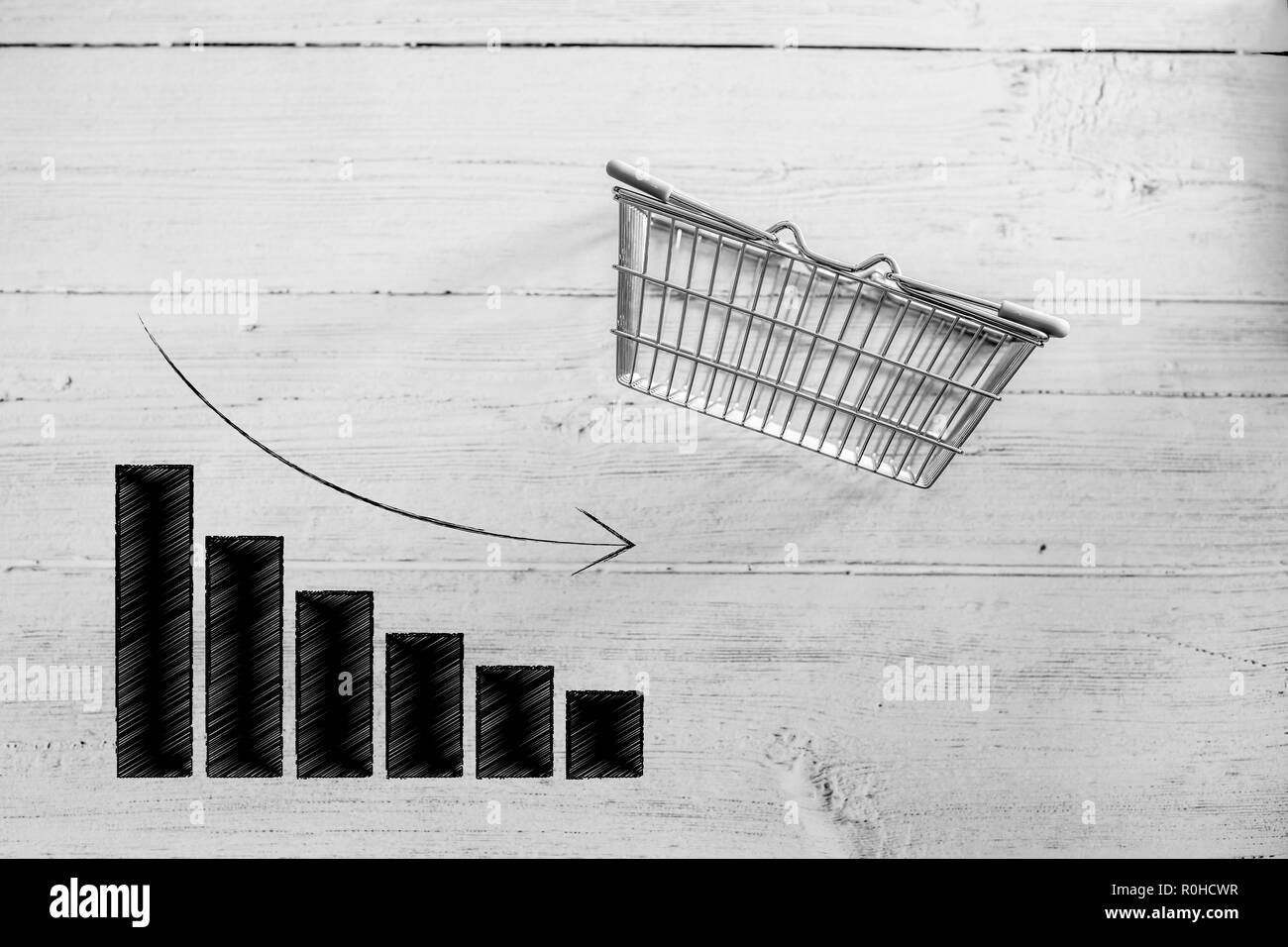 empty shopping basket with bar chart stats going down, concept of ...