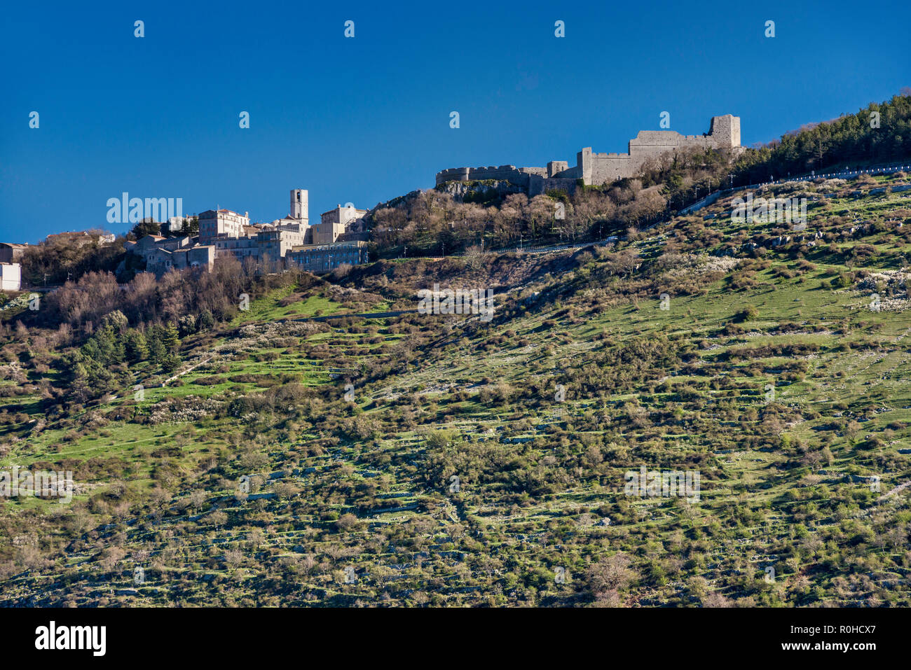 Town of Monte Sant'Angelo on top of terraced hill over Carbonara Valley ...
