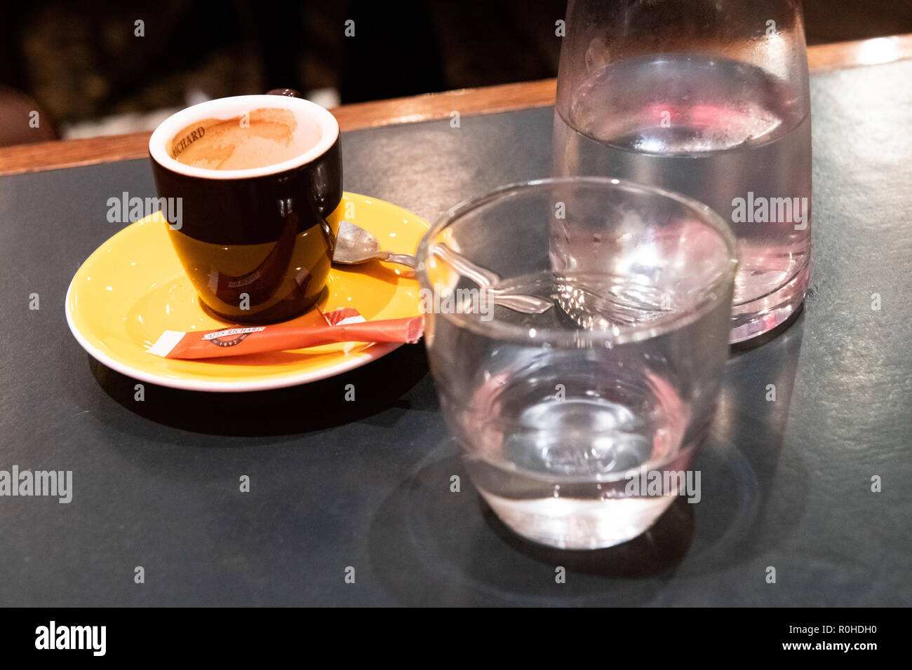 Espresso cafe and a glass of water Stock Photo - Alamy