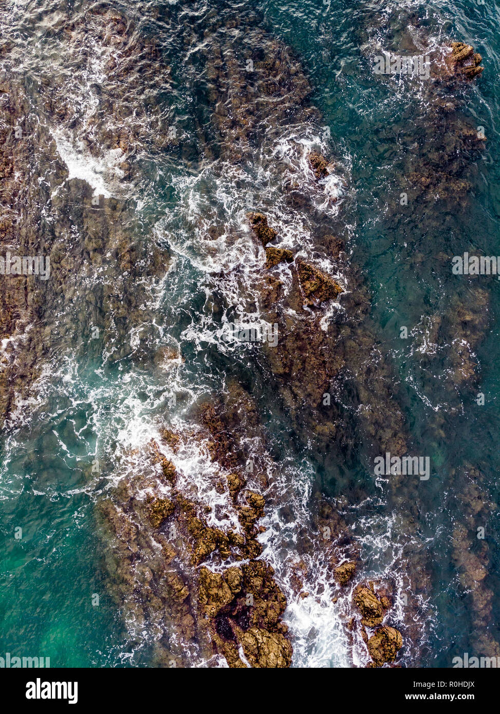 Rocks and cliffs at low tide in atlantic ocean taken by drone Stock ...