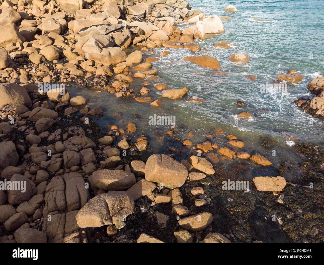 Drone view on round rocks on shore of atlantic ocean in northern France ...