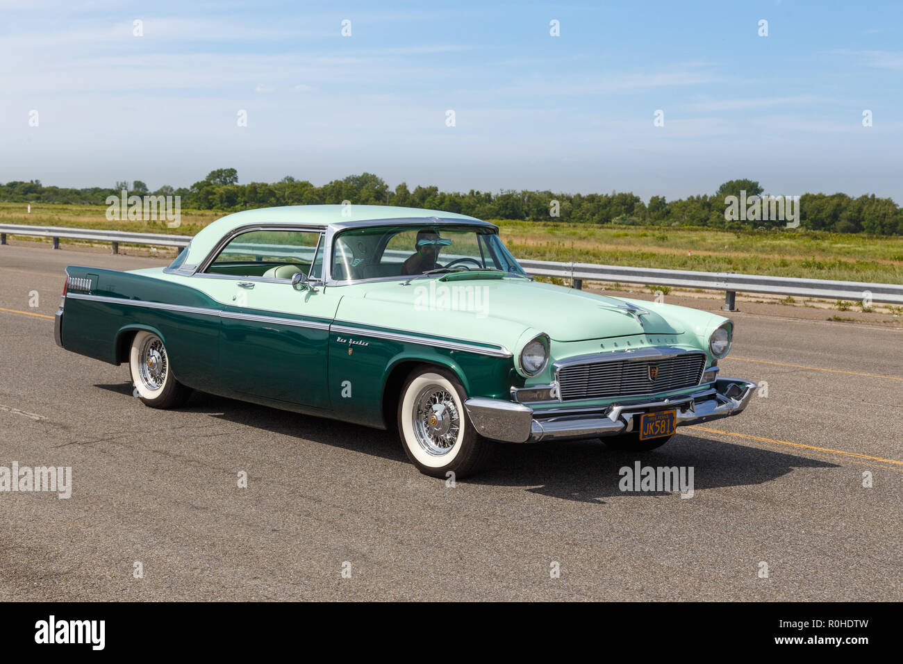 Green 1956 Chrysler New Yorker car on the road Stock Photo - Alamy