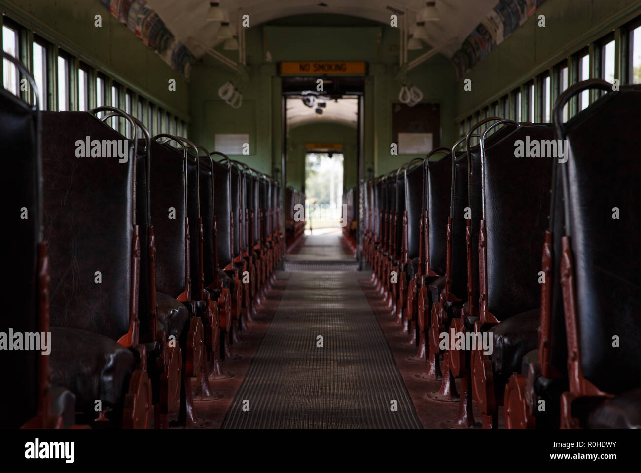 Rows of seats in an old passenger train car Stock Photo - Alamy