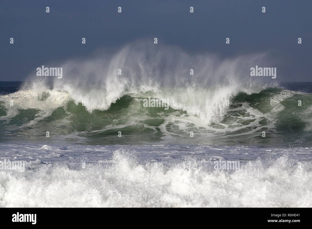 Detailed photo of a crashing wave with beautiful natural light and ...
