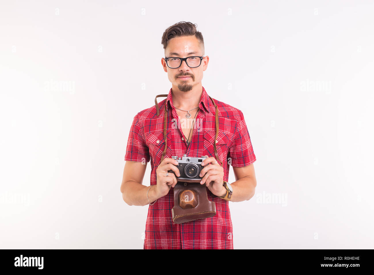 Vintage, photographer and people concept - handsome man with retro ...