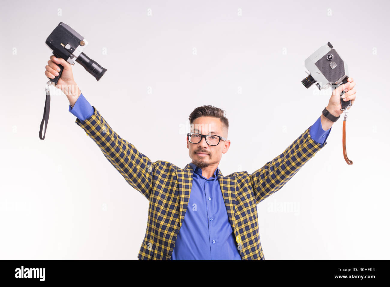 Technologies, photographing and people concept - handsome young man ...