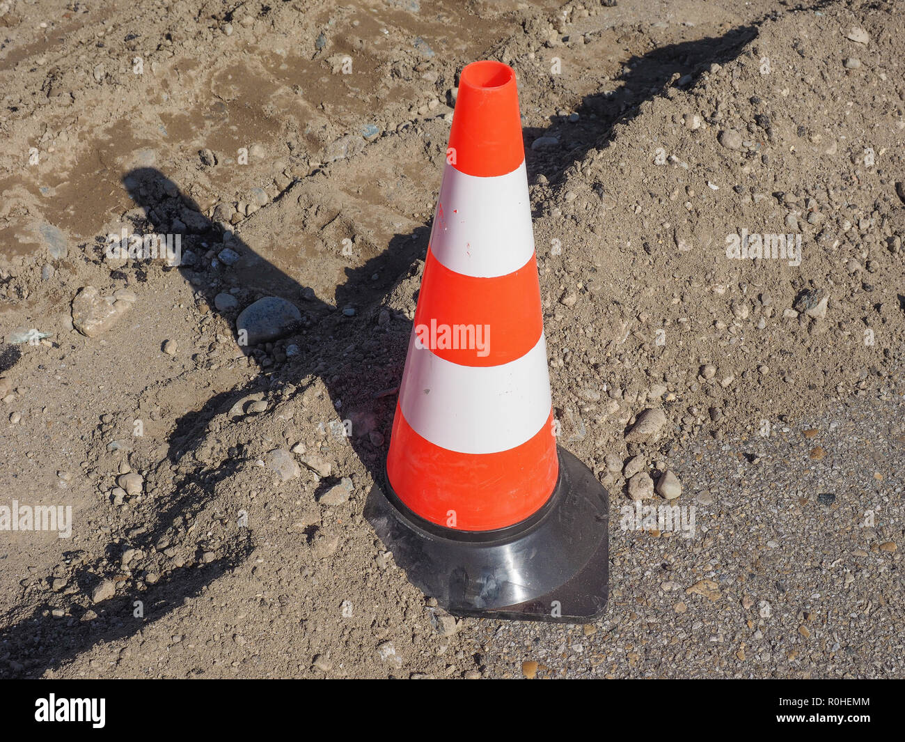 traffic cone to mark road works or temporary obstruction traffic sign ...