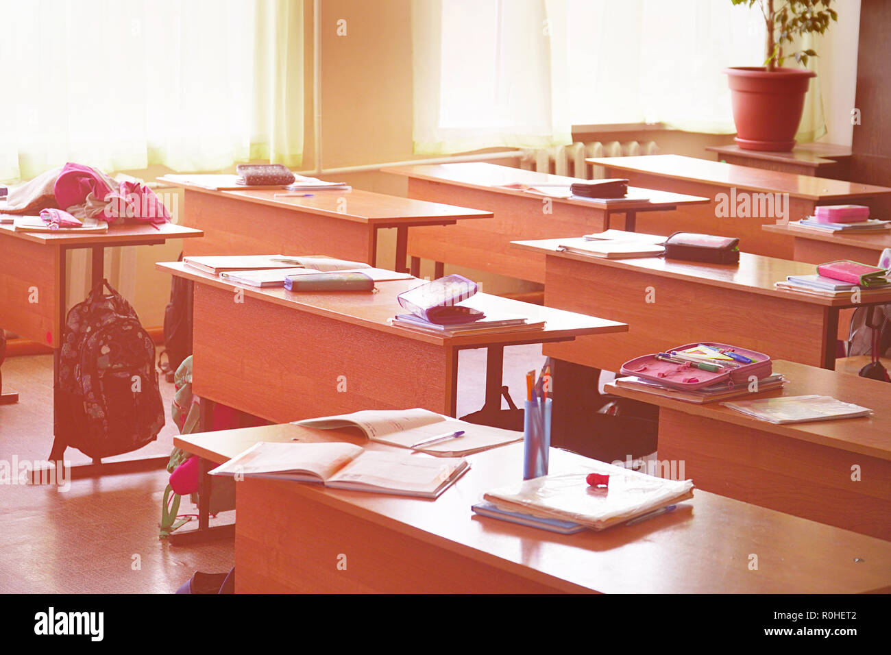 Empty classroom with textbooks, pencils on its desks Stock Photo - Alamy